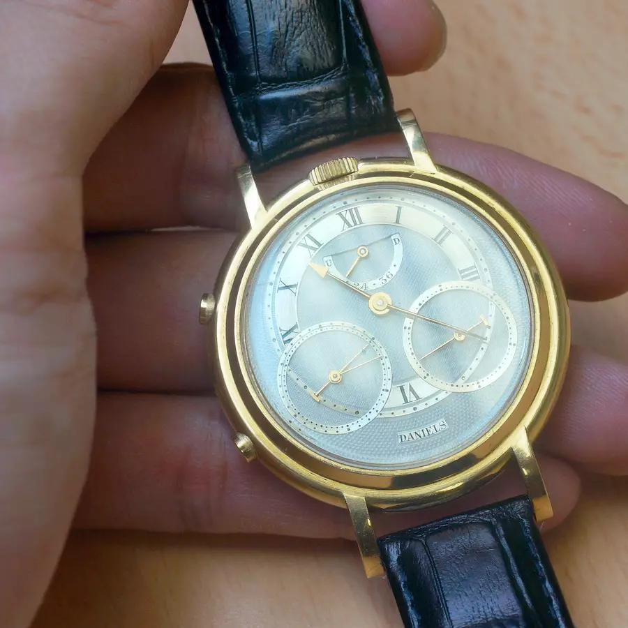 George Daniels koaxiálny chronograf Tourbillon v ruke